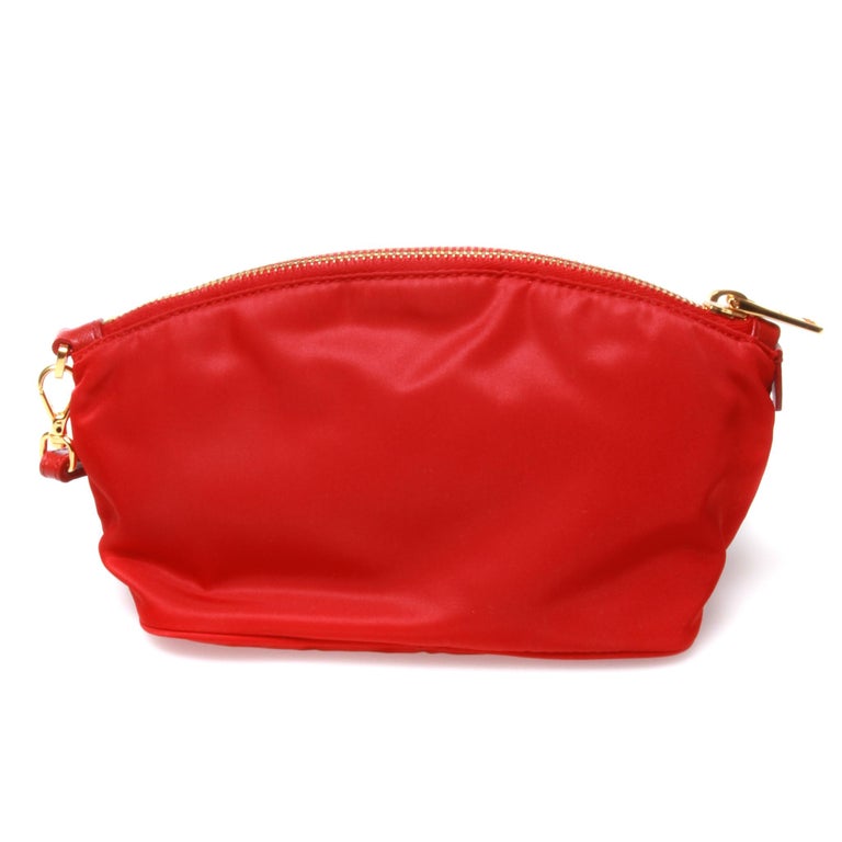 Prada small red clutch with gold hardware and red leather strap at ...