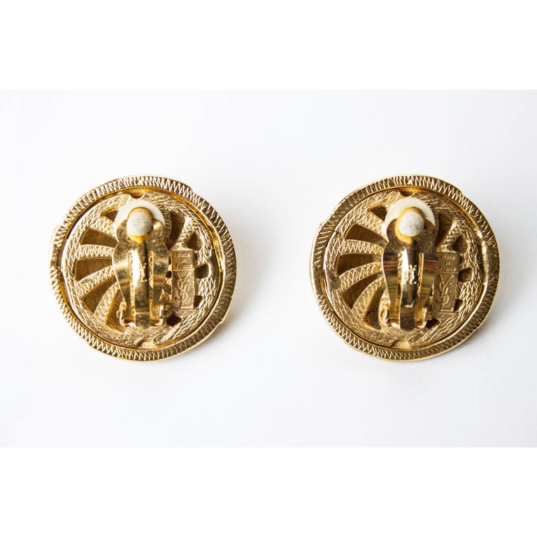 Yves Saint Laurent Pyramid shaped gold plated simulated emerald clip ...