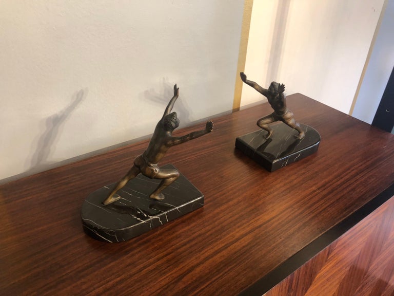 Art Deco Bronze Bookends with Black Marble Bases at 1stDibs