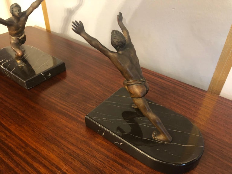 Art Deco Bronze Bookends with Black Marble Bases at 1stDibs