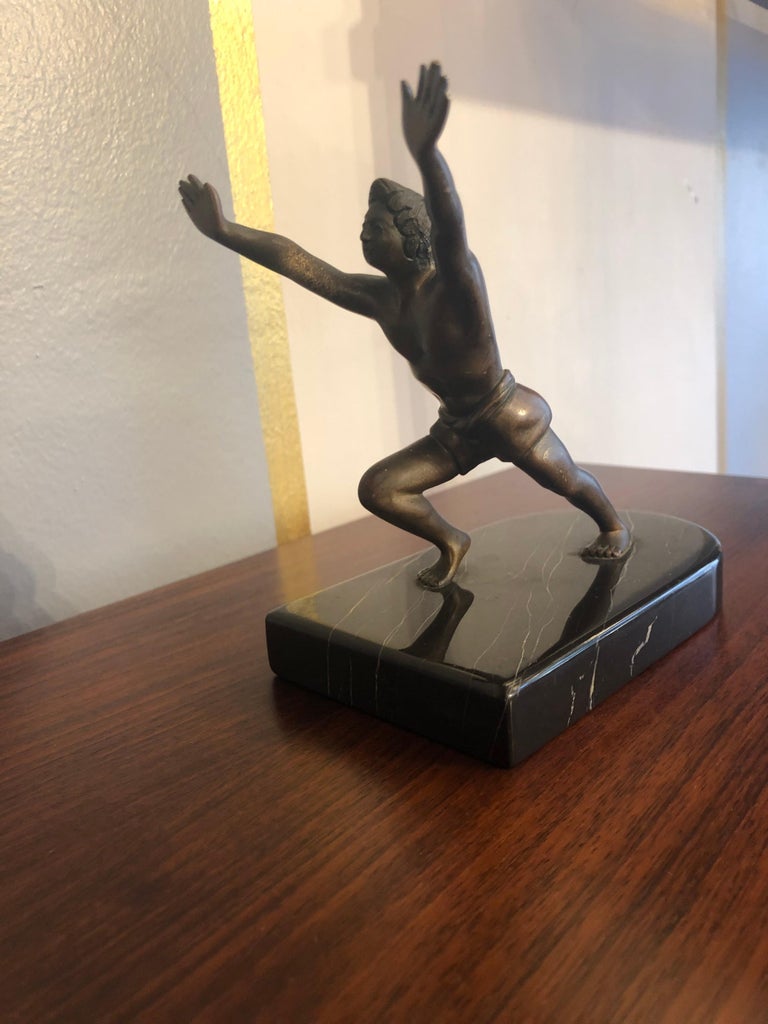 Art Deco Bronze Bookends with Black Marble Bases at 1stDibs