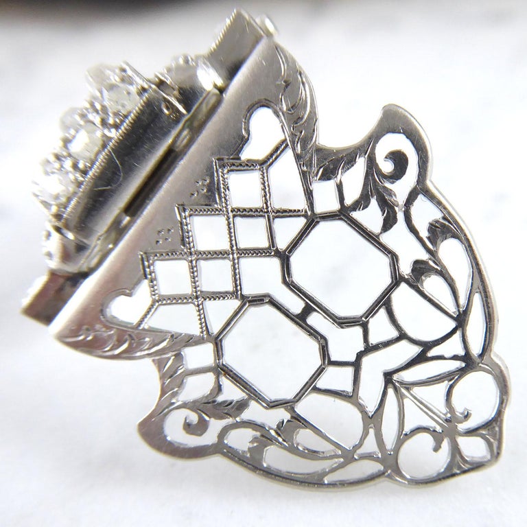 Art Deco Emerald and Diamond Lapel Pin at 1stDibs