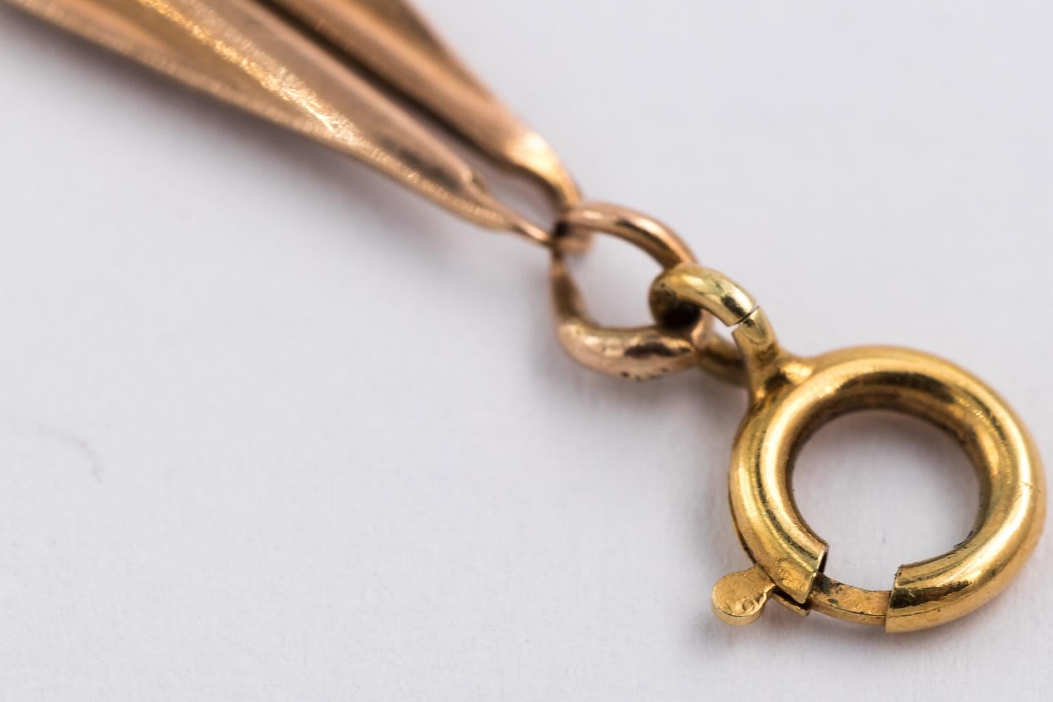 Art Deco Gold Watch Chain with Charm at 1stDibs