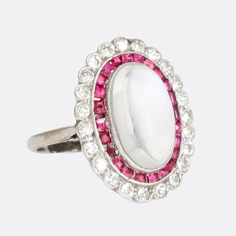 Art Deco Moonstone Ruby Diamond Halo Cocktail Ring at 1stDibs