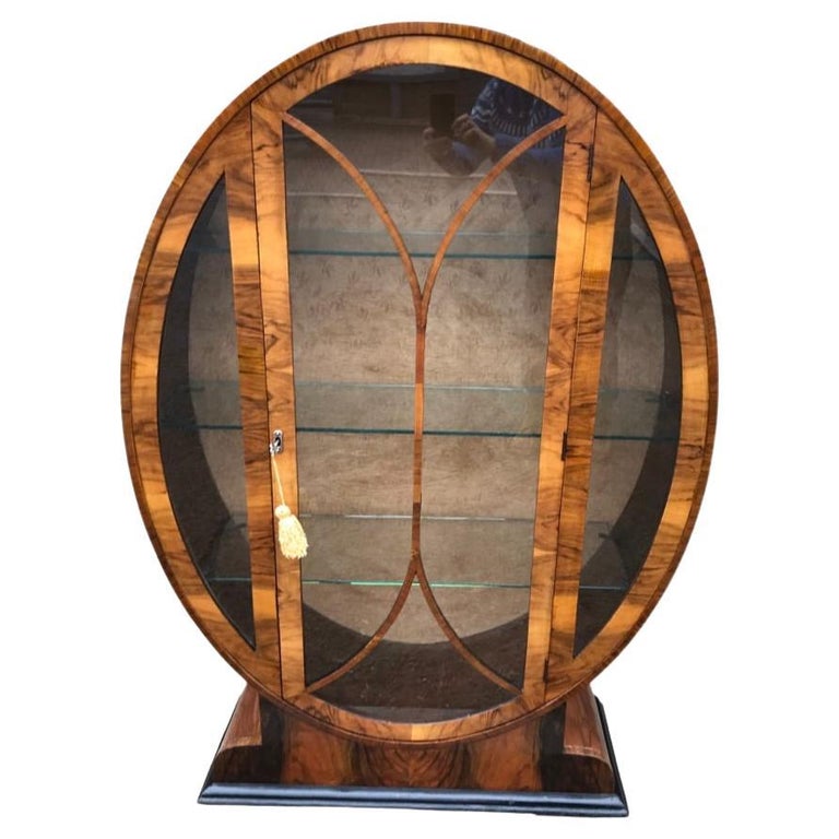 Art Deco Oval Display Cabinet in figured walnut For Sale at 1stDibs