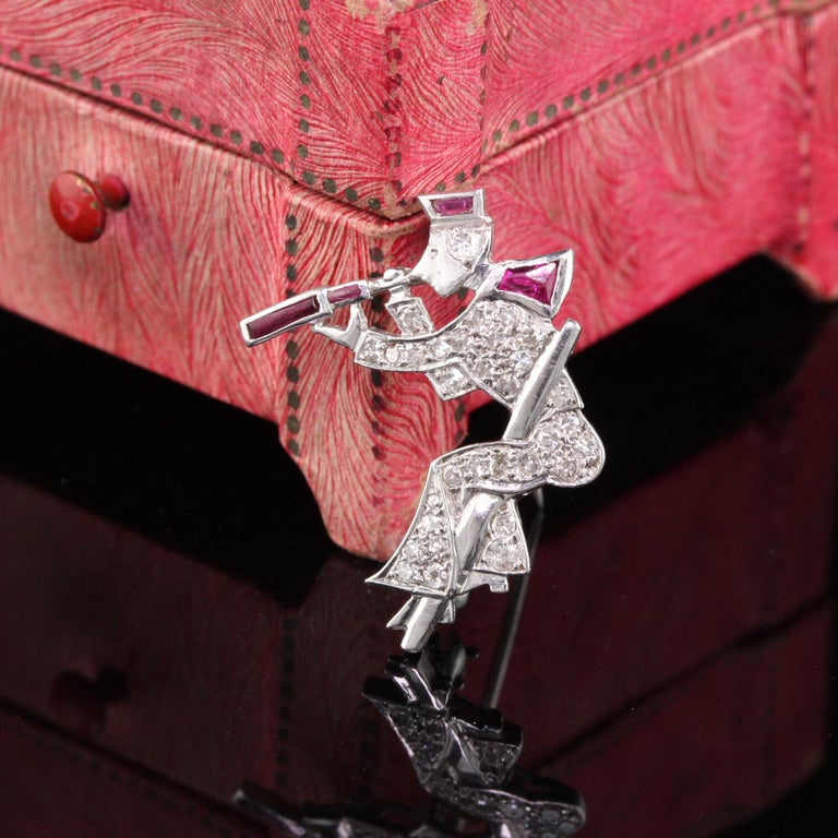 Art Deco Platinum Diamond and Ruby Explorer Pin at 1stDibs