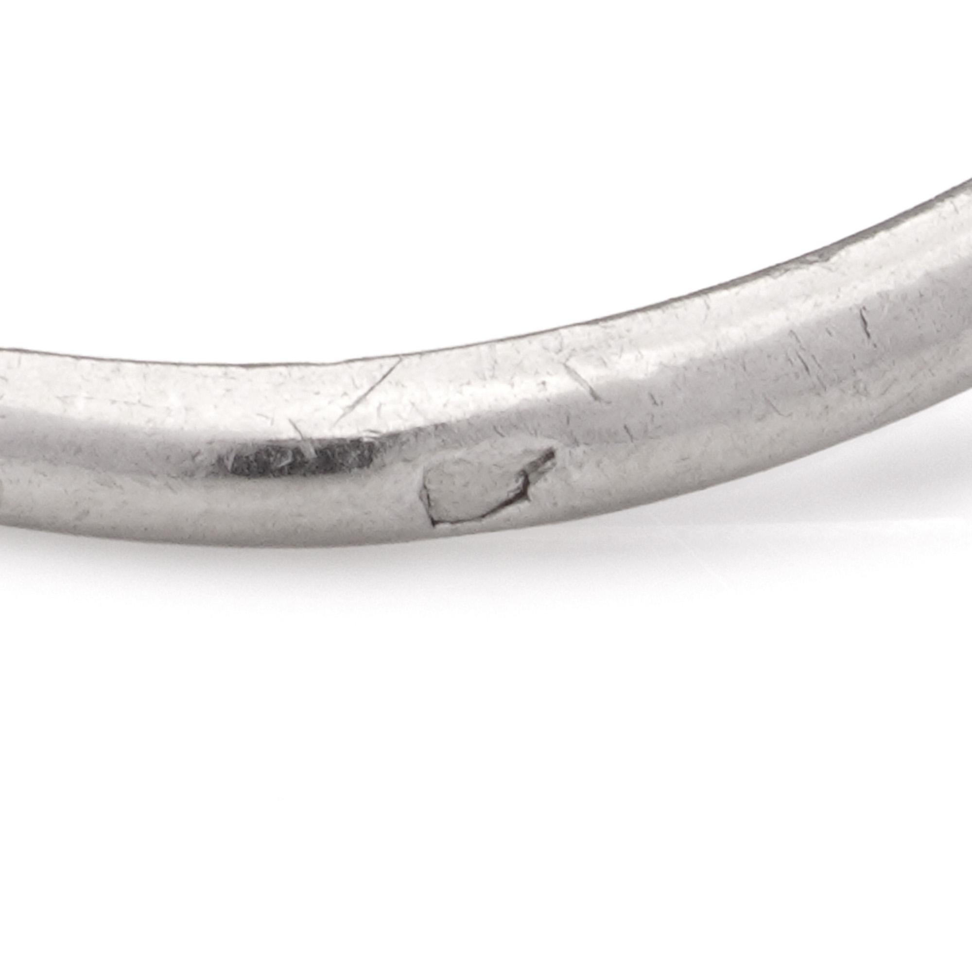 Art Deco platinum ring featuring a marquise-shaped central diamond ring ...