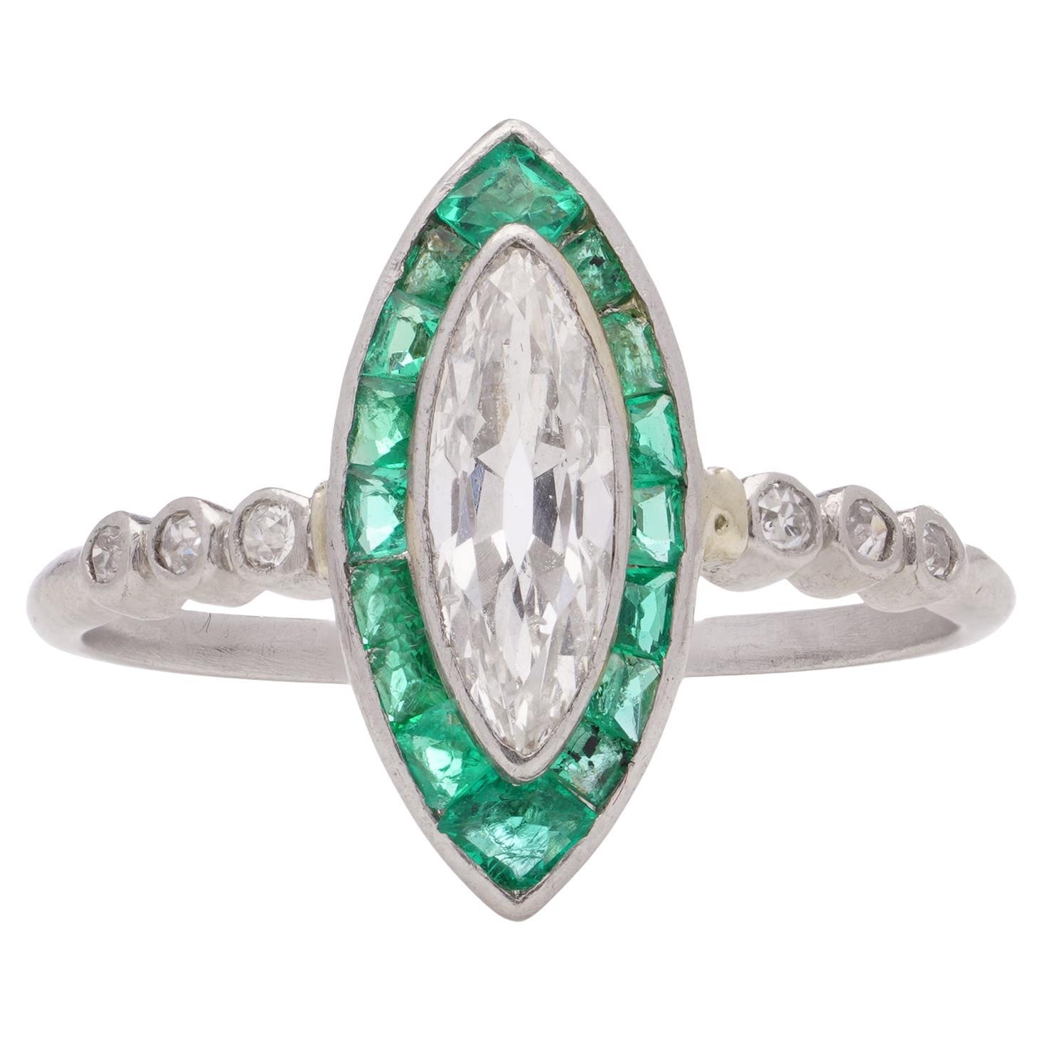 Art Deco platinum ring featuring a marquise-shaped central diamond ring ...