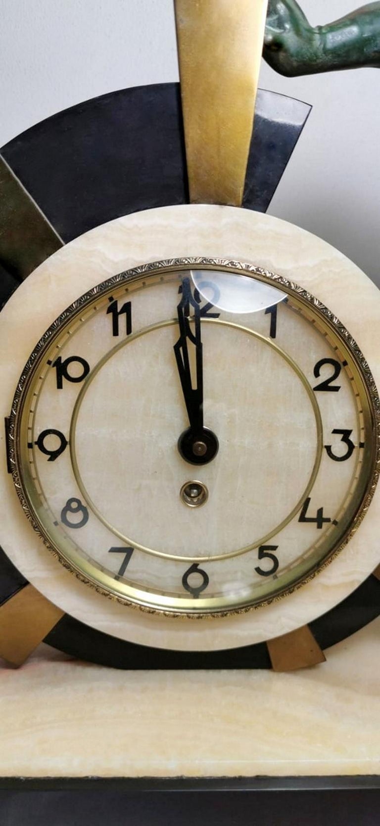 Art Deco Table Clock with Huge Bronze Statue, France at 1stDibs