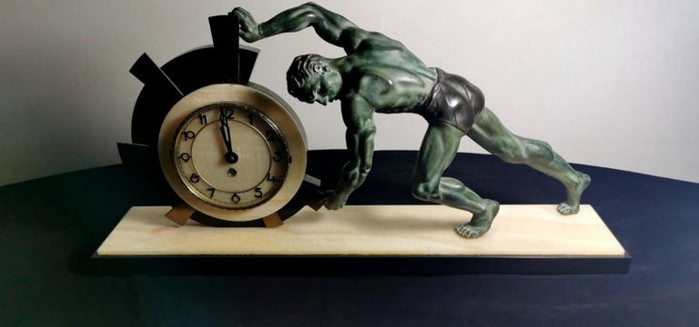 Art Deco Table Clock with Huge Bronze Statue, France at 1stDibs