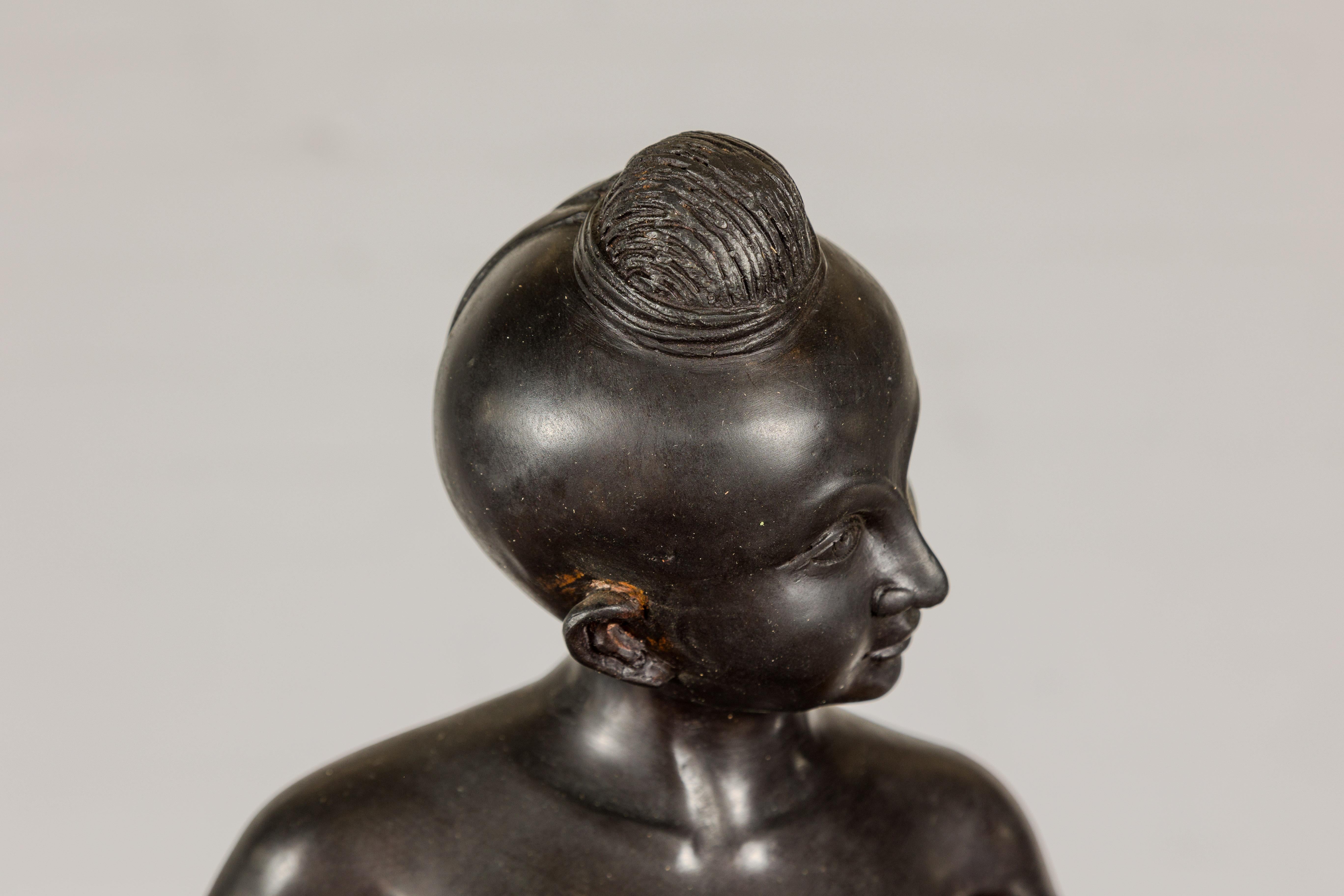 Asian Inspired Bronze Tabletop Statue in Dark Patina For Sale at 1stDibs