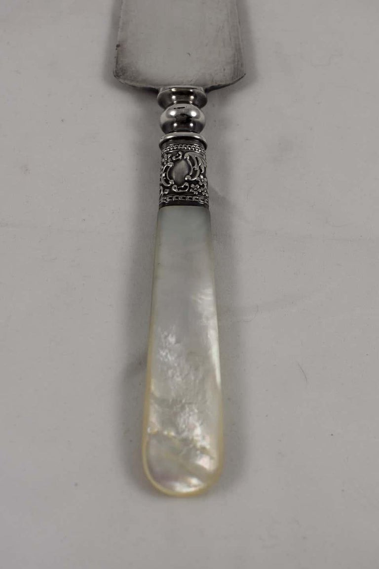 Assorted Pearl Handled and Sterling Silver Collared Table Servers ...
