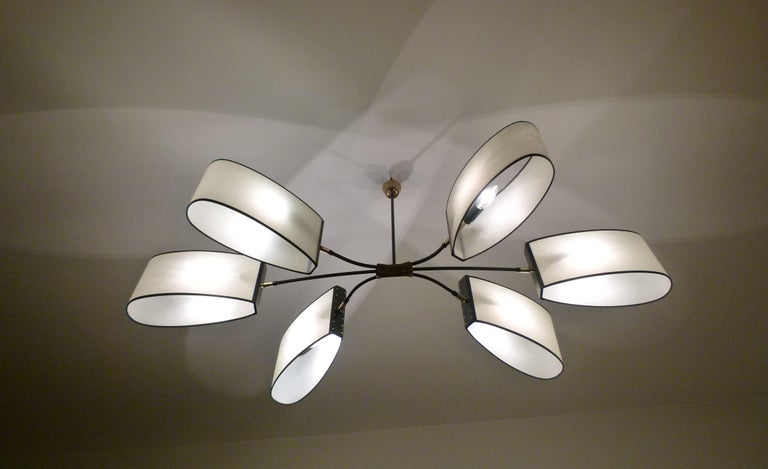 Asymmetrical chandelier with six lighted arms by Maison Lunel, circa ...