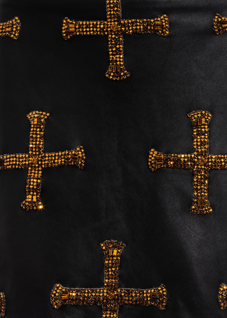 Atelier Versace black leather mini skirt with gold embellished crosses ...