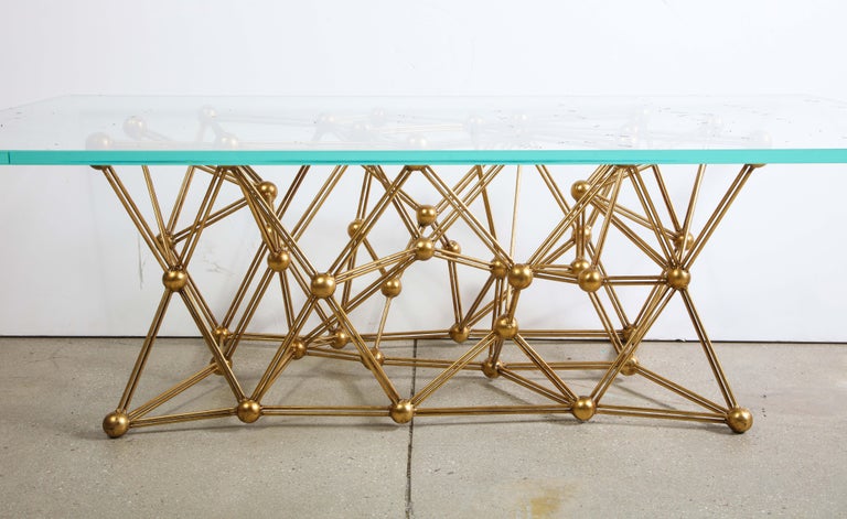 "Atomic" Coffee Table with glass top over a gilded metal base For Sale ...
