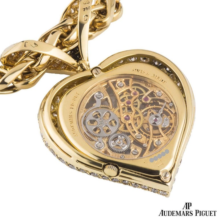 Audemars Piguet Diamond and Emerald Pendant Watch Necklace at 1stDibs