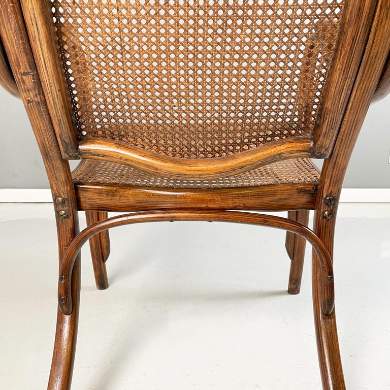 Austrian Armchair with Dark Brown Straw and Solid Wood in Thonet Style, 1900s For Sale at 1stDibs