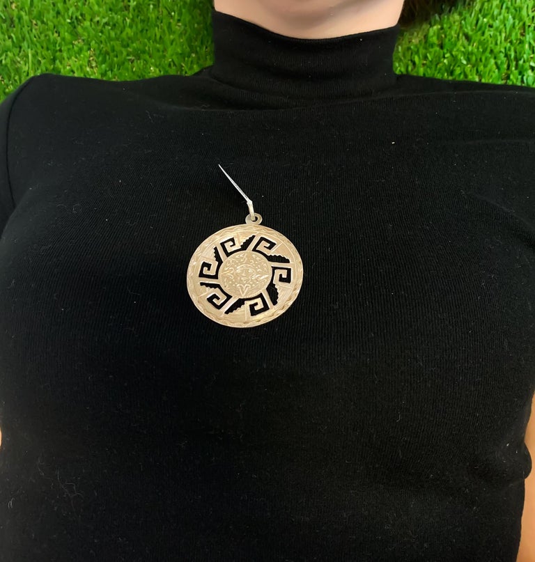 Aztec Style Design Silver Carved Round Pendant For Sale at 1stDibs