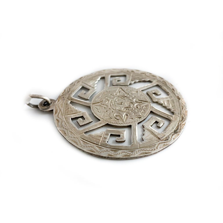 Aztec Style Design Silver Carved Round Pendant For Sale at 1stDibs