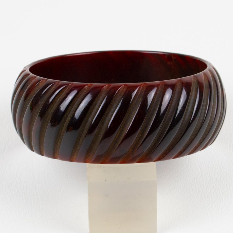 Bakelite Carved Bracelet Bangle Red Sangria Marble For Sale at 1stDibs