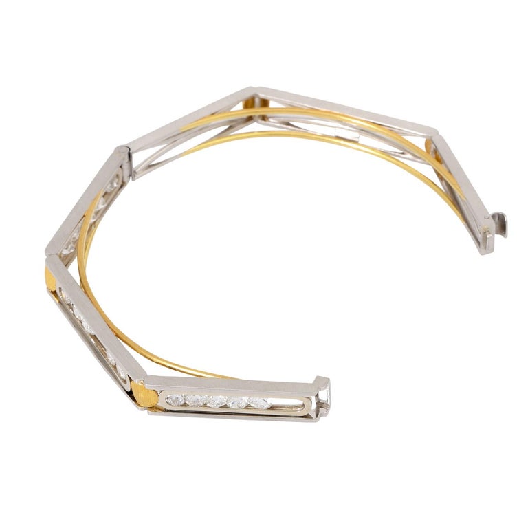Bangle with 15 moveable brilliant-cut diamonds total approx. 3.72 ct ...