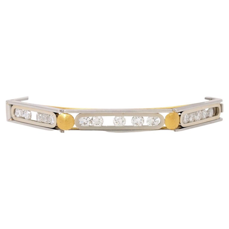 Bangle with 15 moveable brilliant-cut diamonds total approx. 3.72 ct ...