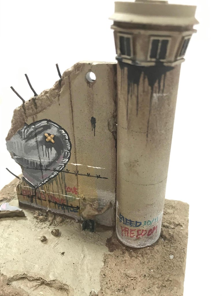 Banksy - Banksy Broken Heart Palestine Sculpture From The Walled Off ...