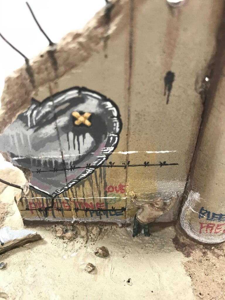 Banksy - Banksy Broken Heart Palestine Sculpture From The Walled Off ...