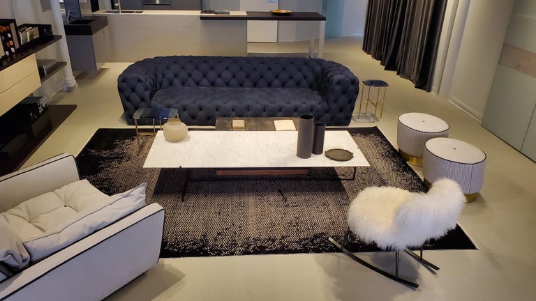 A Pair of Anais Texture Leather Brass Base Ottomans by Draga and Aurel ...