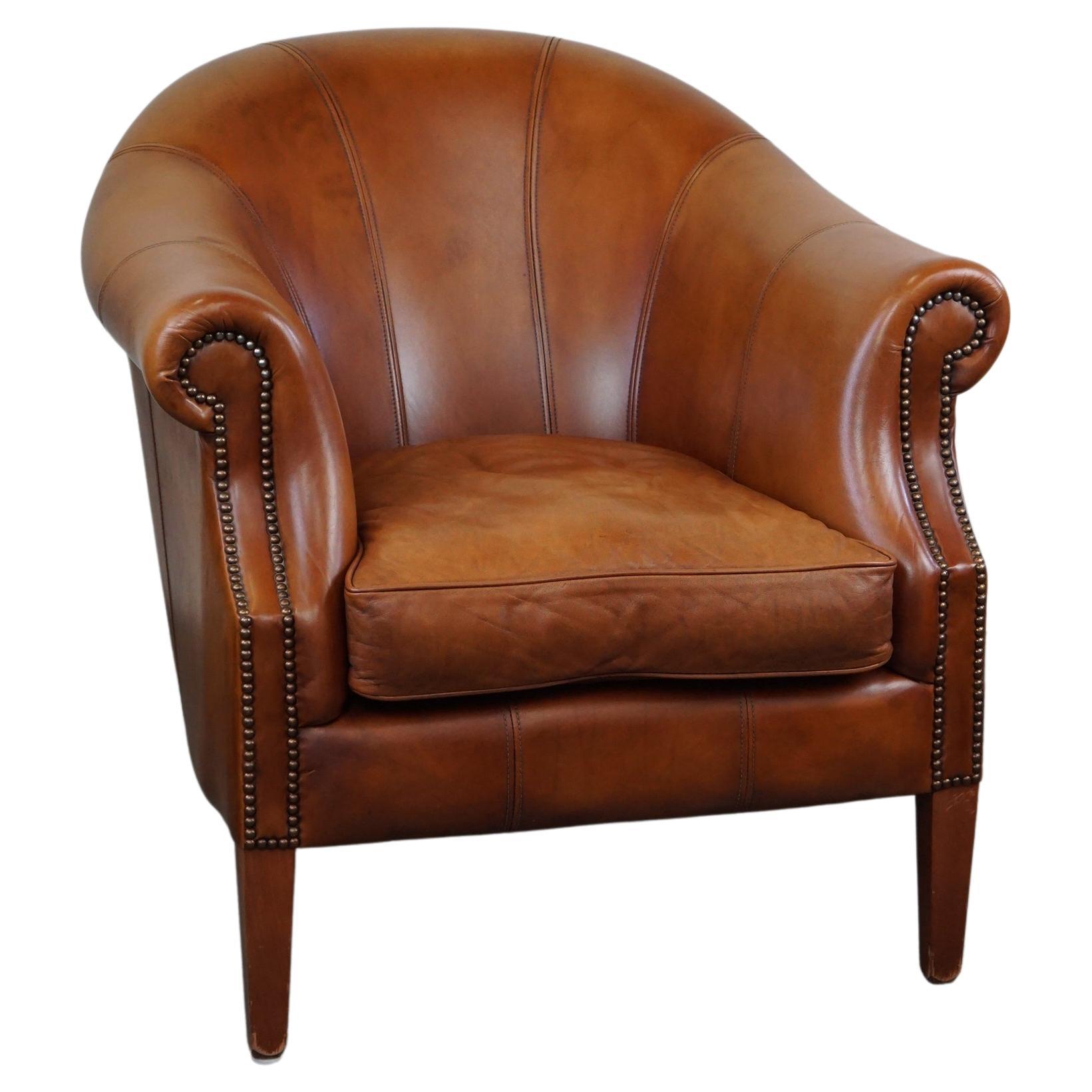 Beautiful and high-quality cowhide leather club armchair in cognac ...