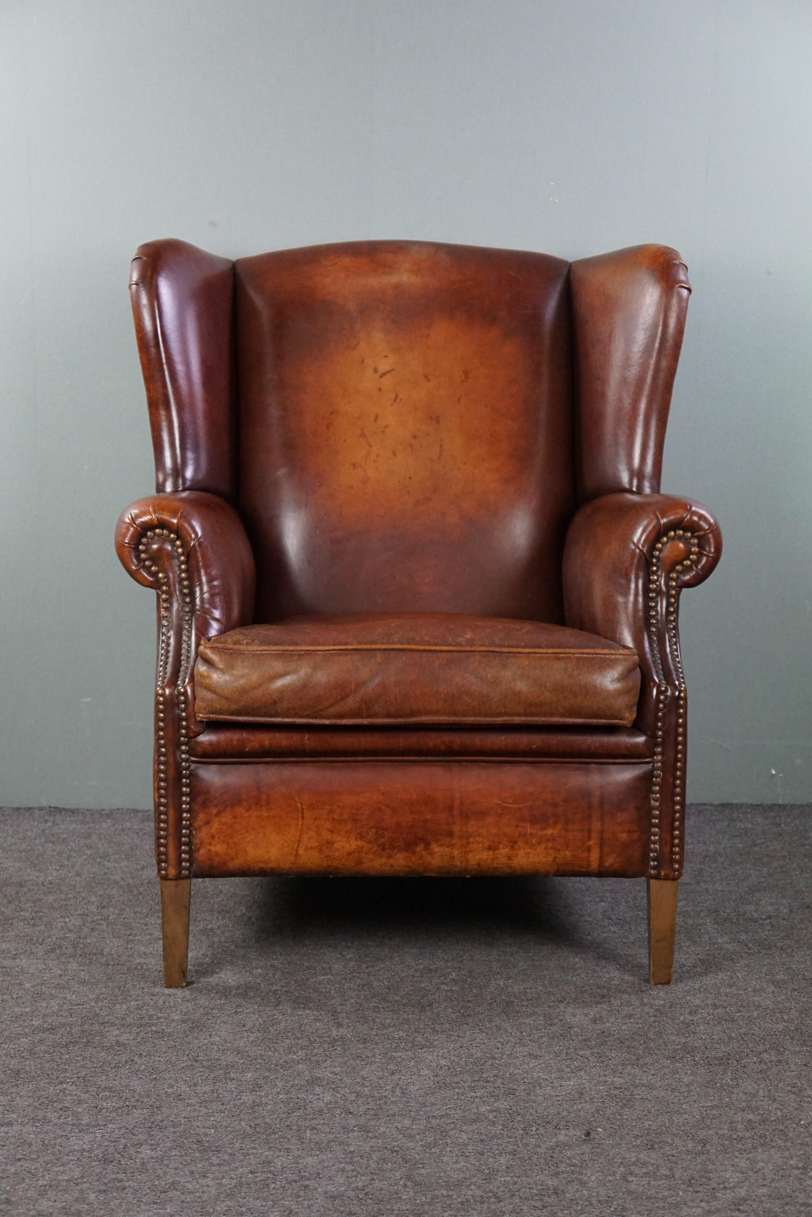 Beautiful sheep leather wingback chair in a wonderful warm cognac color ...