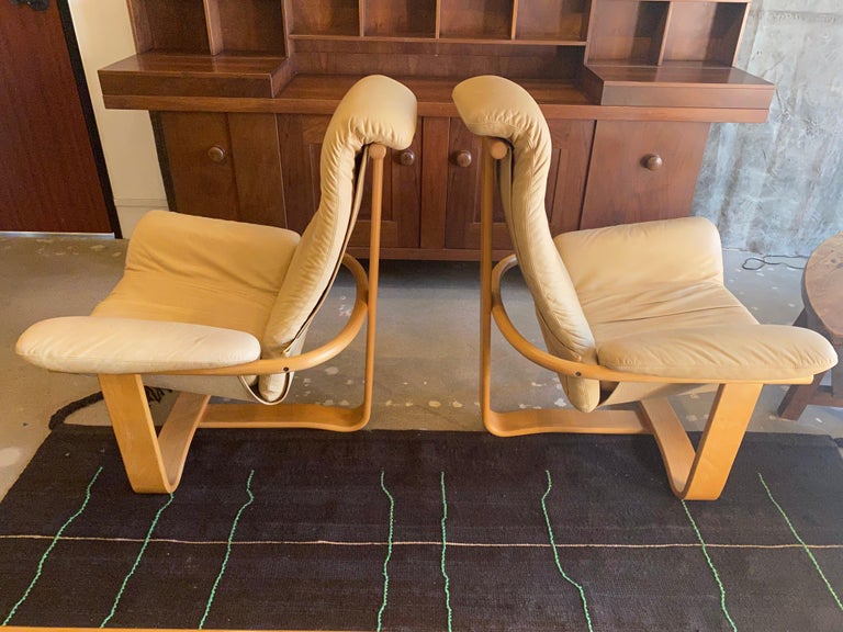 Beech and Buff Leather Scandinavian Lounge Chairs, 1970's at 1stDibs