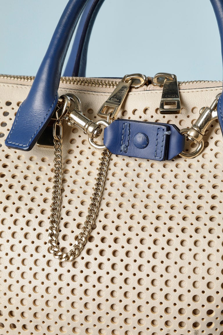 Beige perforated leather bag with blue leather handle and bottom Chloé ...