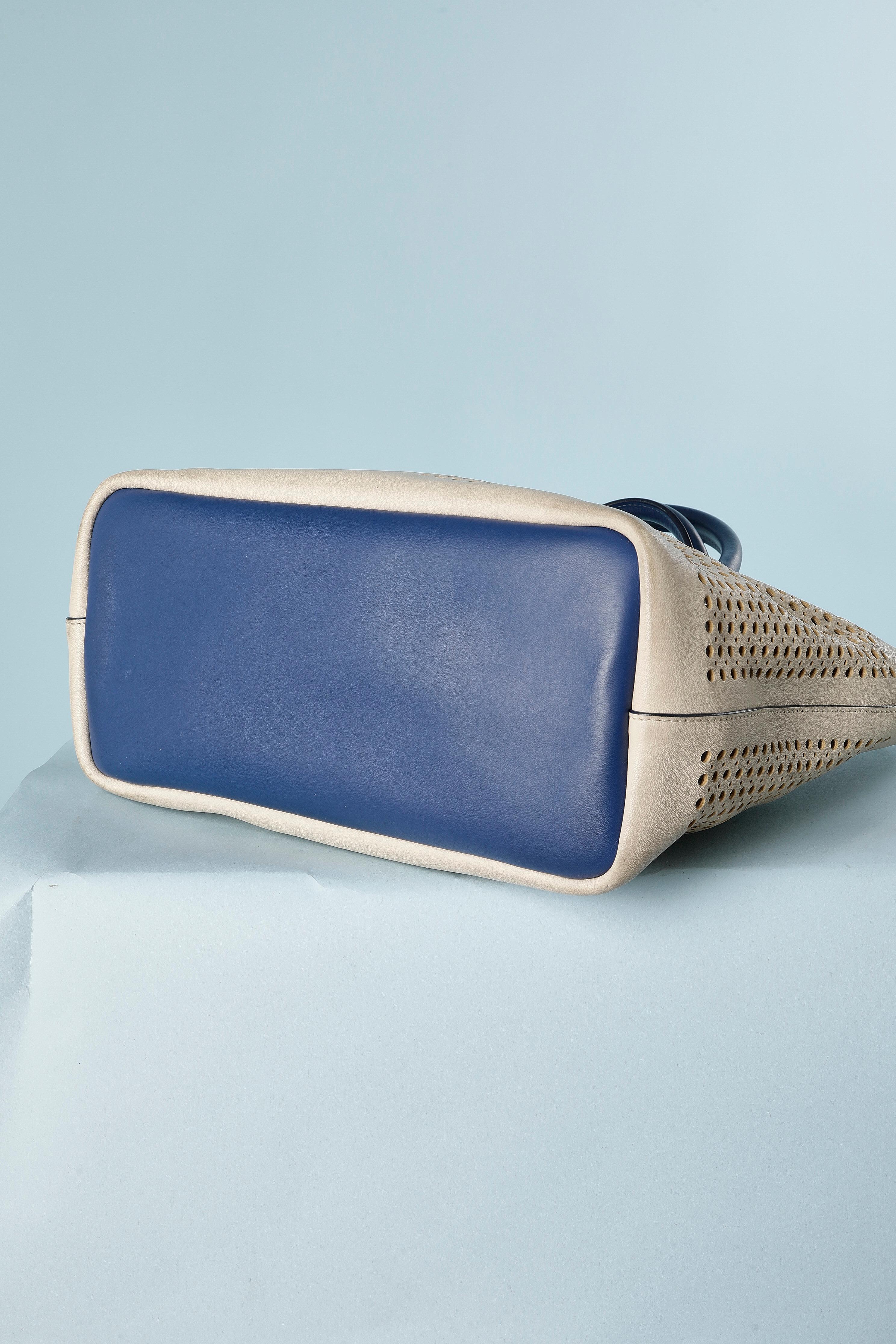 Beige perforated leather bag with blue leather handle and bottom Chloé ...