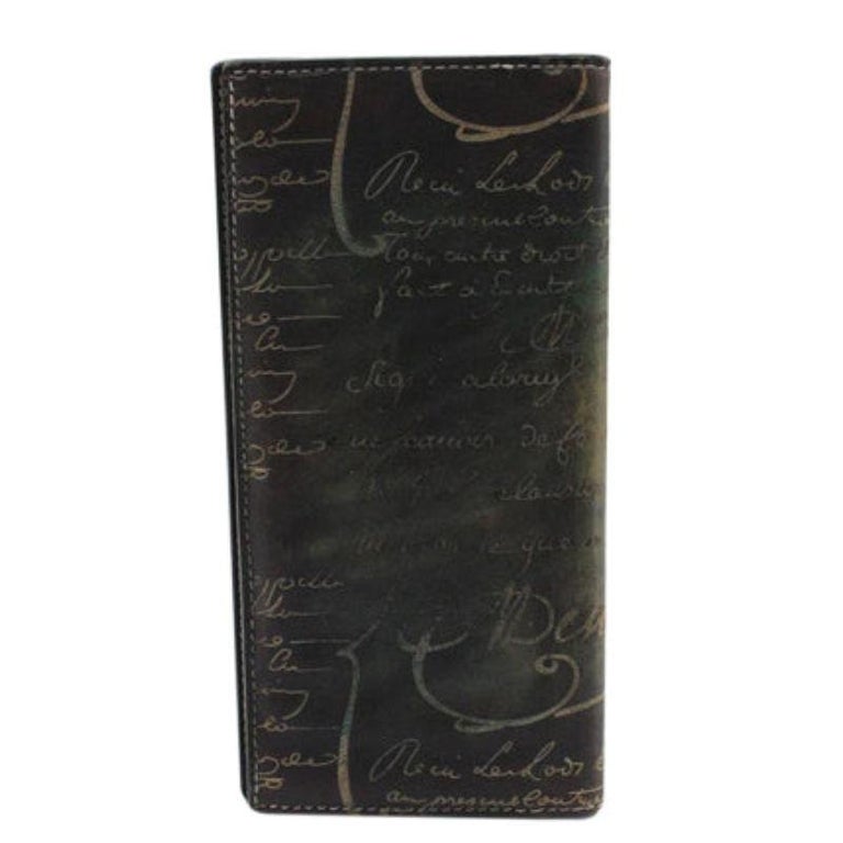 Berluti Calligraphy Bifold long wallet is crafted in black Scritto ...
