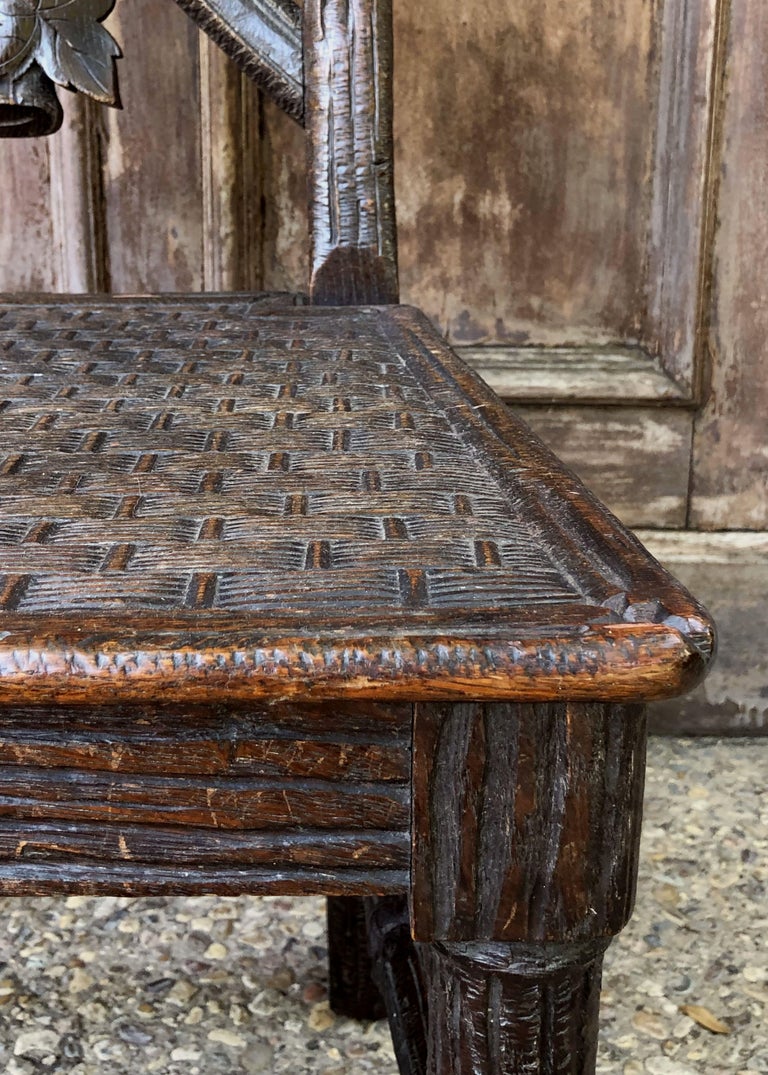 Black Forest Chair of Carved Oak from the 19th Century at 1stDibs