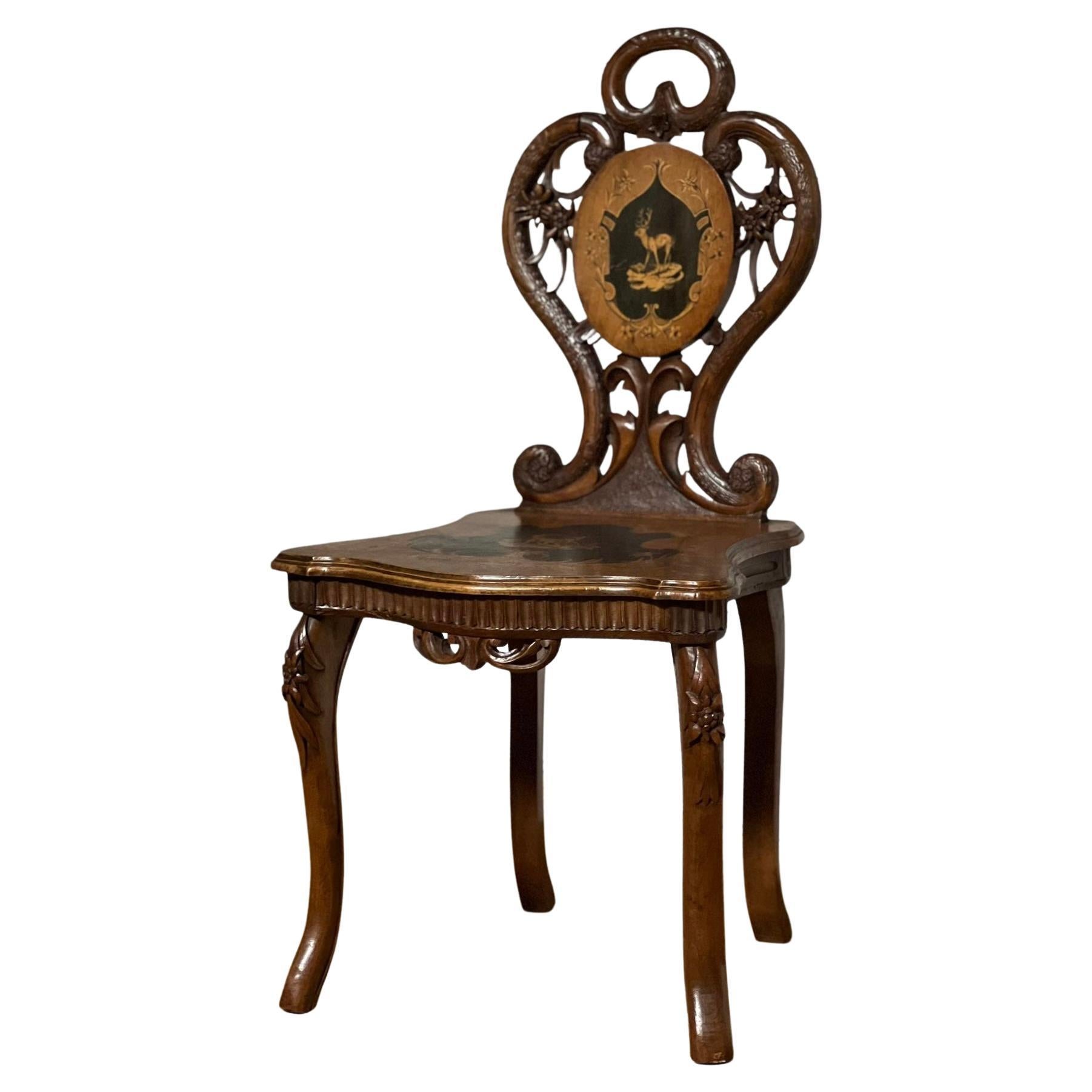 Pair of Carved German Black Forest Chestnut Hallway Chairs at 1stDibs