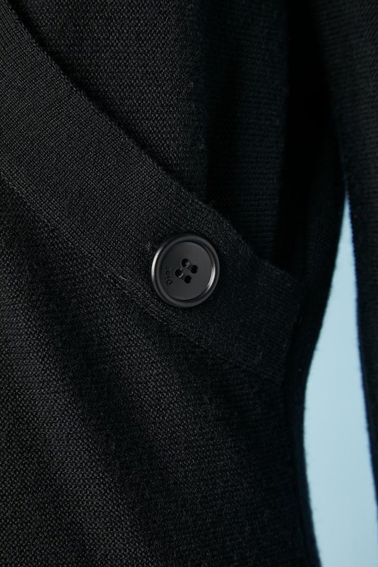 Black knit dress with decorative branded button on the edge Christian ...