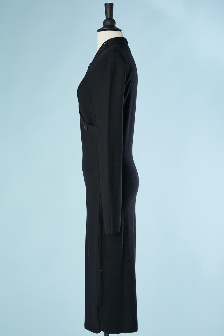 Black knit dress with decorative branded button on the edge Christian ...