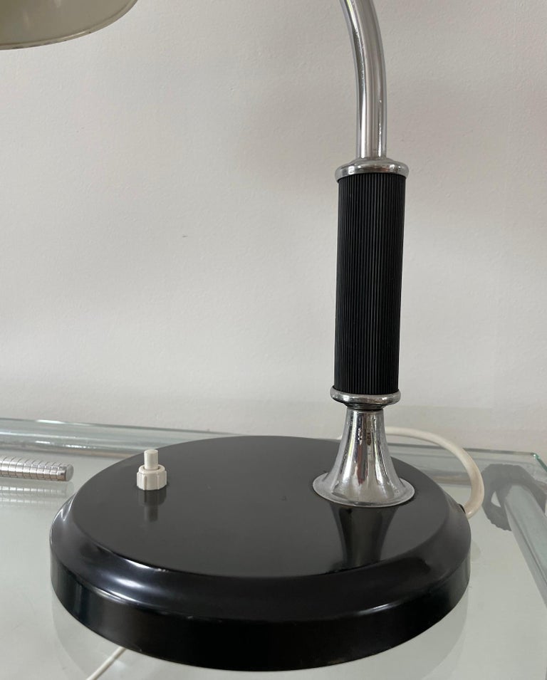 Black metal and chromed table light by Helo Leuchten, circa 1945 For ...