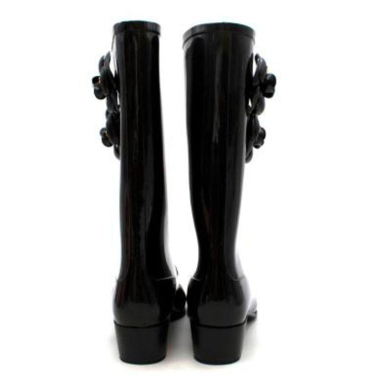 black rubber Camelia applique long rain boots For Sale at 1stDibs
