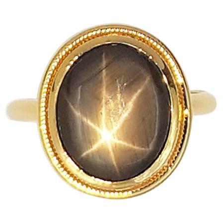 Black Star Sapphire Ring set in 18K Gold Settings For Sale at 1stDibs