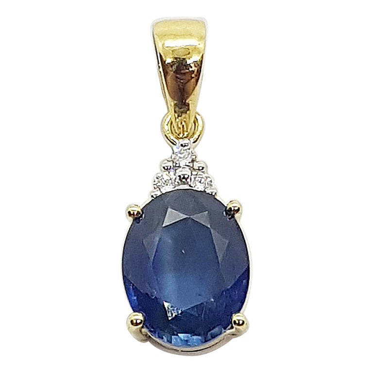 Pendentif en or 18 carats serti d'un saphir bleu et de diamants - En ...