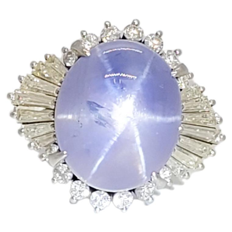 GIA Certified 30.37 Carat Oval Cabochon Star Sapphire Diamond Platinum Ring For Sale at 1stDibs