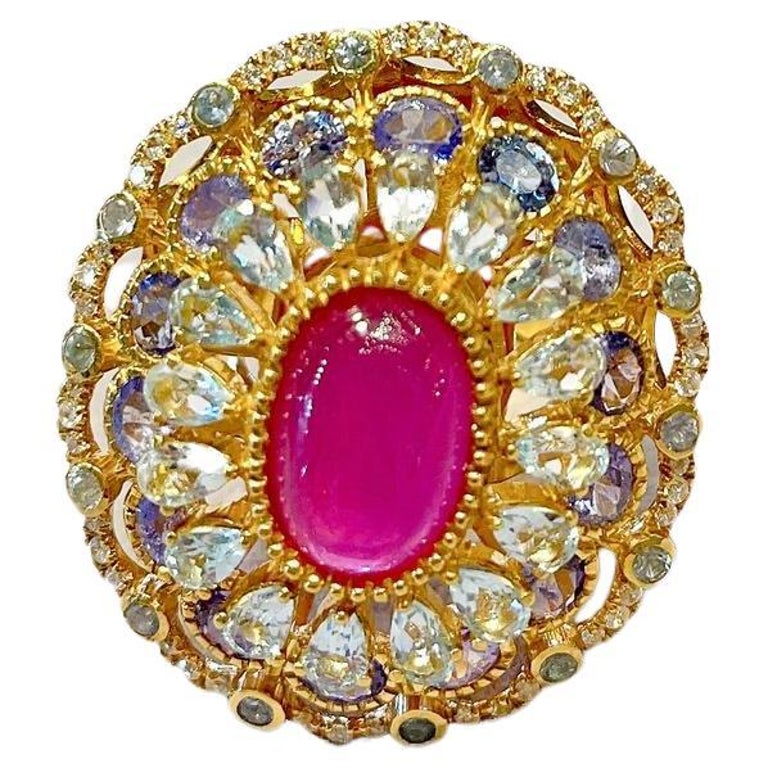 Red Ruby, Tanzanite, Blue and White Topaz Cocktail Ring For Sale at 1stDibs