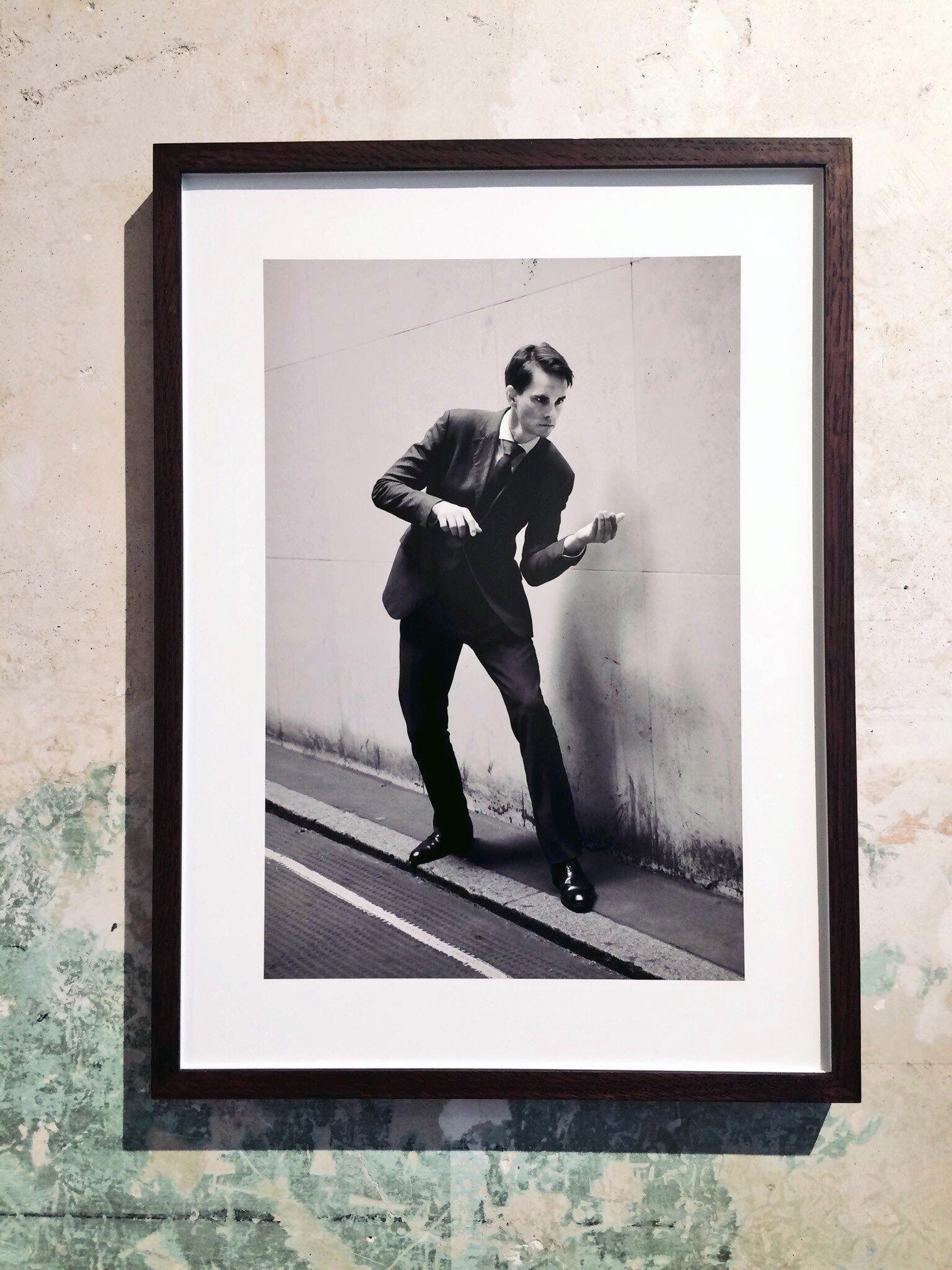 Brian Griffin - A portrait of a man in the suit posing with the ...