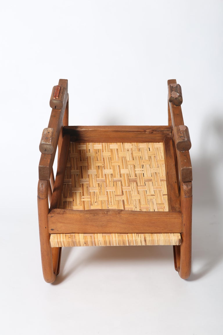 British Colonial Rattan fireside Chair at 1stDibs