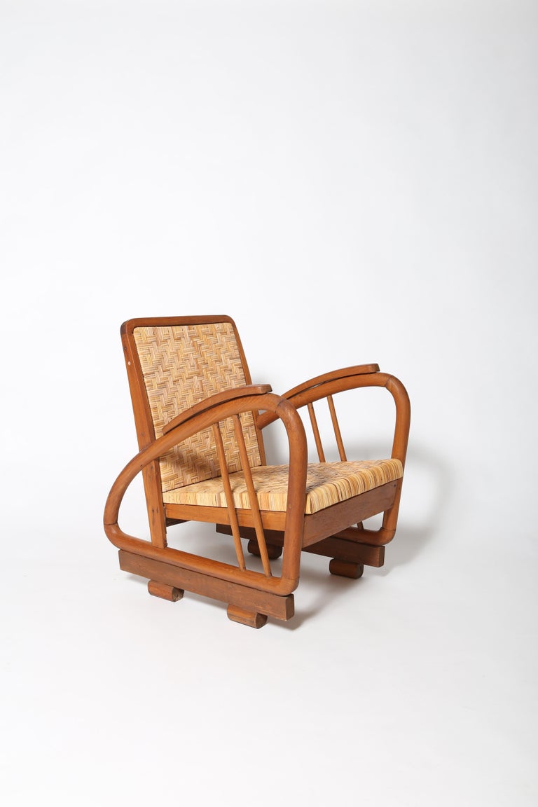 British Colonial Rattan fireside Chair at 1stDibs