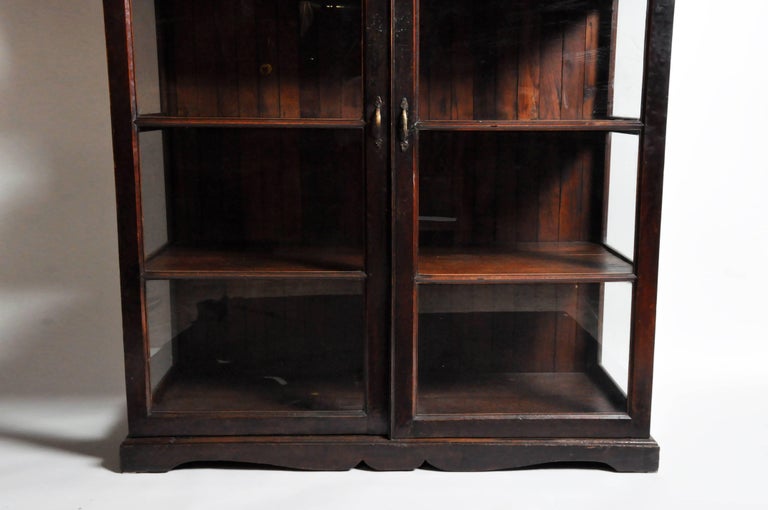 British Colonial Display Cabinet with Glazed Sides and Doors at 1stDibs