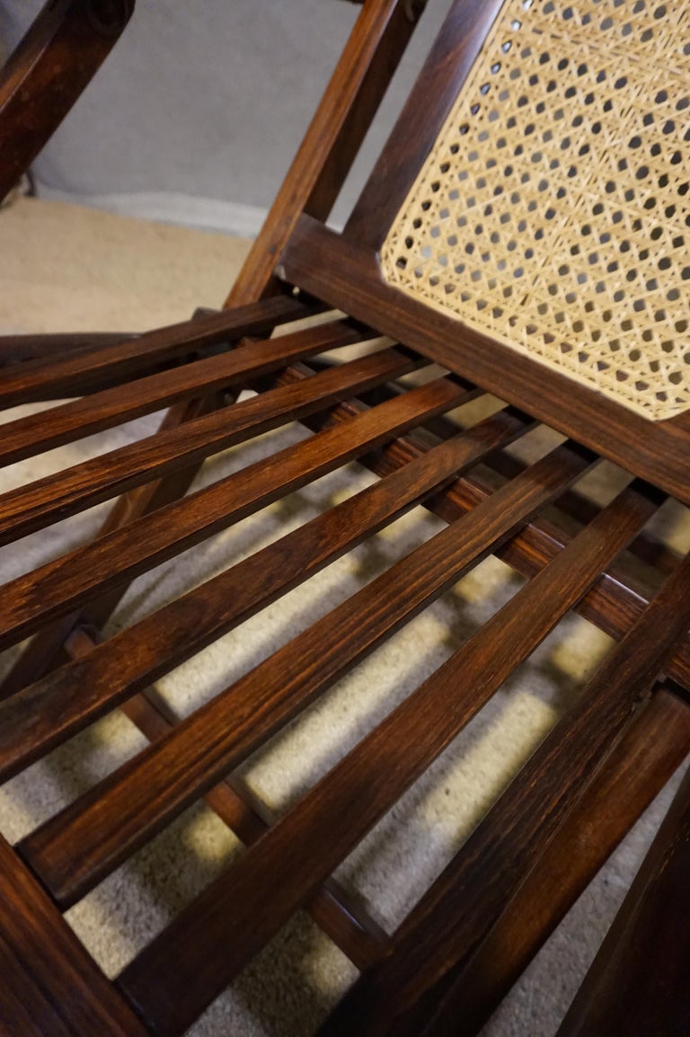British Colonial Folding Campaign Chair with Cane Work and Bolts at 1stDibs